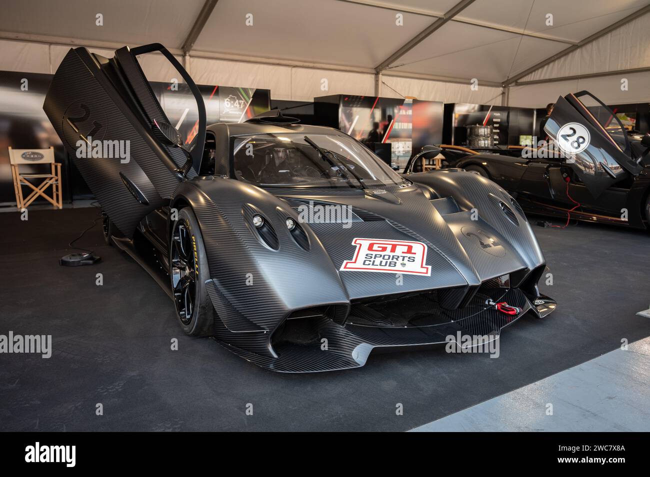 Front view of a stunning textured carbon fiber colored Pagani Huayra R ...