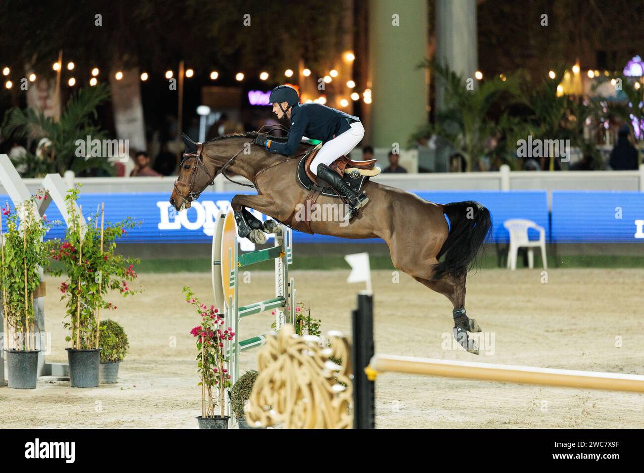 Robin Naeve of Germany with Carlito H during the CSI4*-W - Longines Al Shira’aa FEI Jumping ...