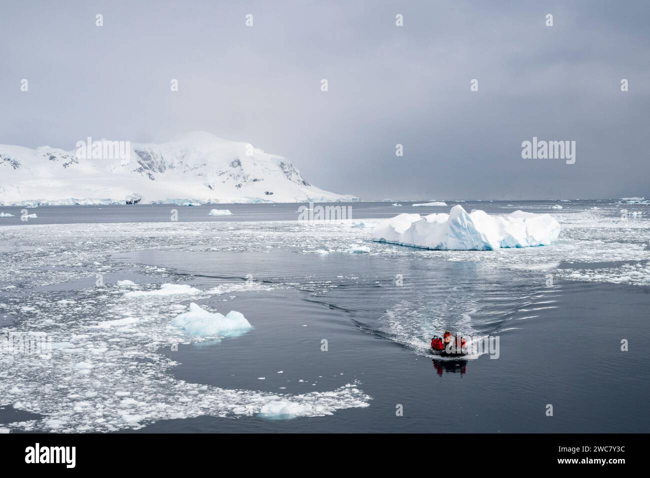 Zodiac navigating through the ice at Neko Harbor, Antarctica, ice ...