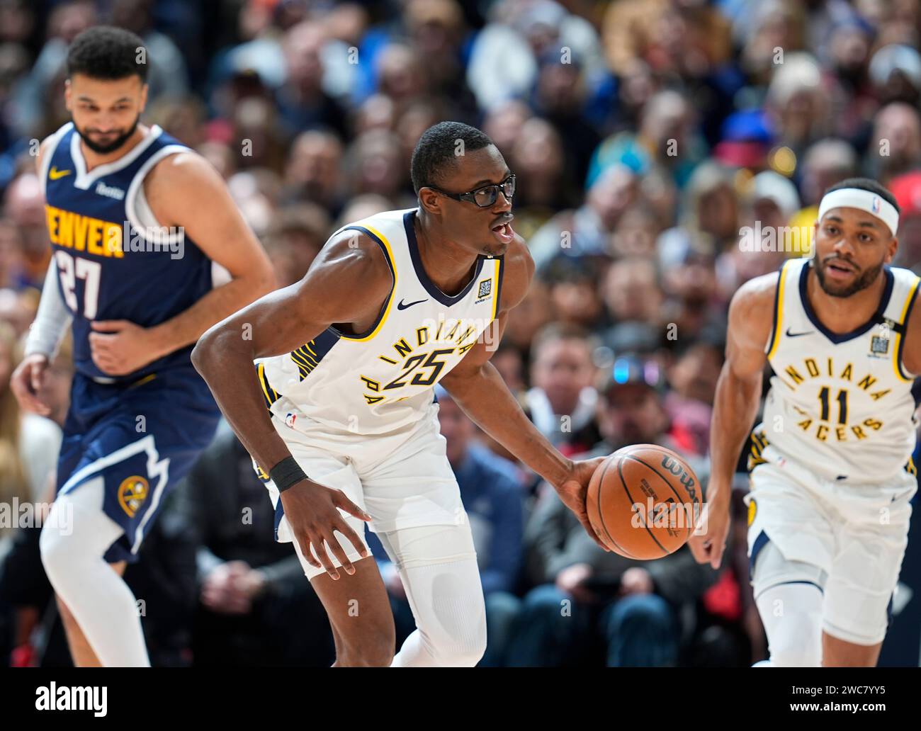 Indiana Pacers forward Jalen Smith, center, collects the ball as Pacers ...