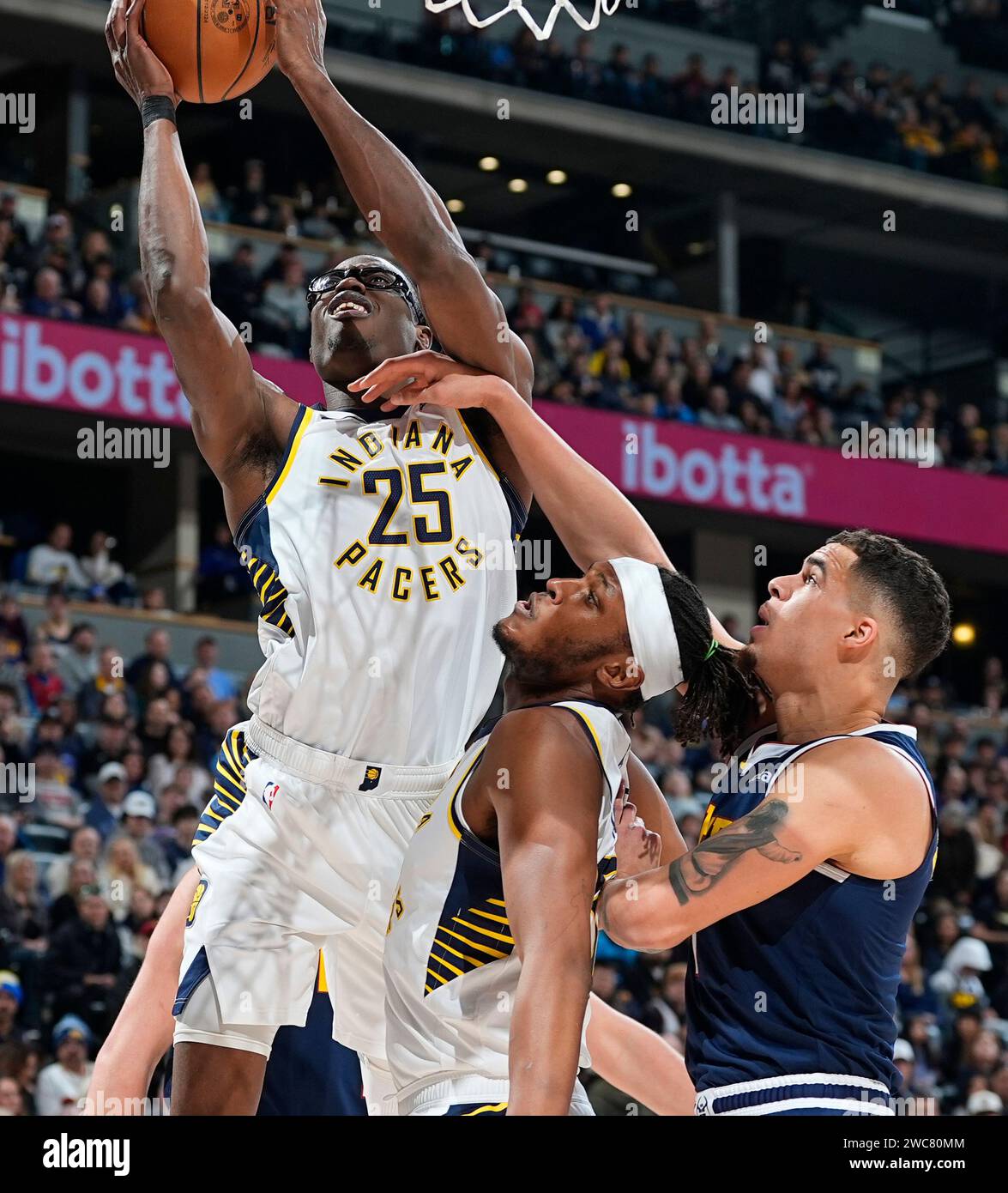 Indiana Pacers forward Jalen Smith, left, runs into Pacers center Myles ...