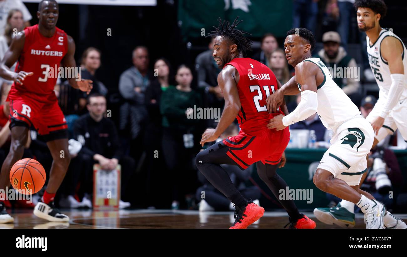 Michigan State guard Tyson Walker, right, and Rutgers guard Austin ...