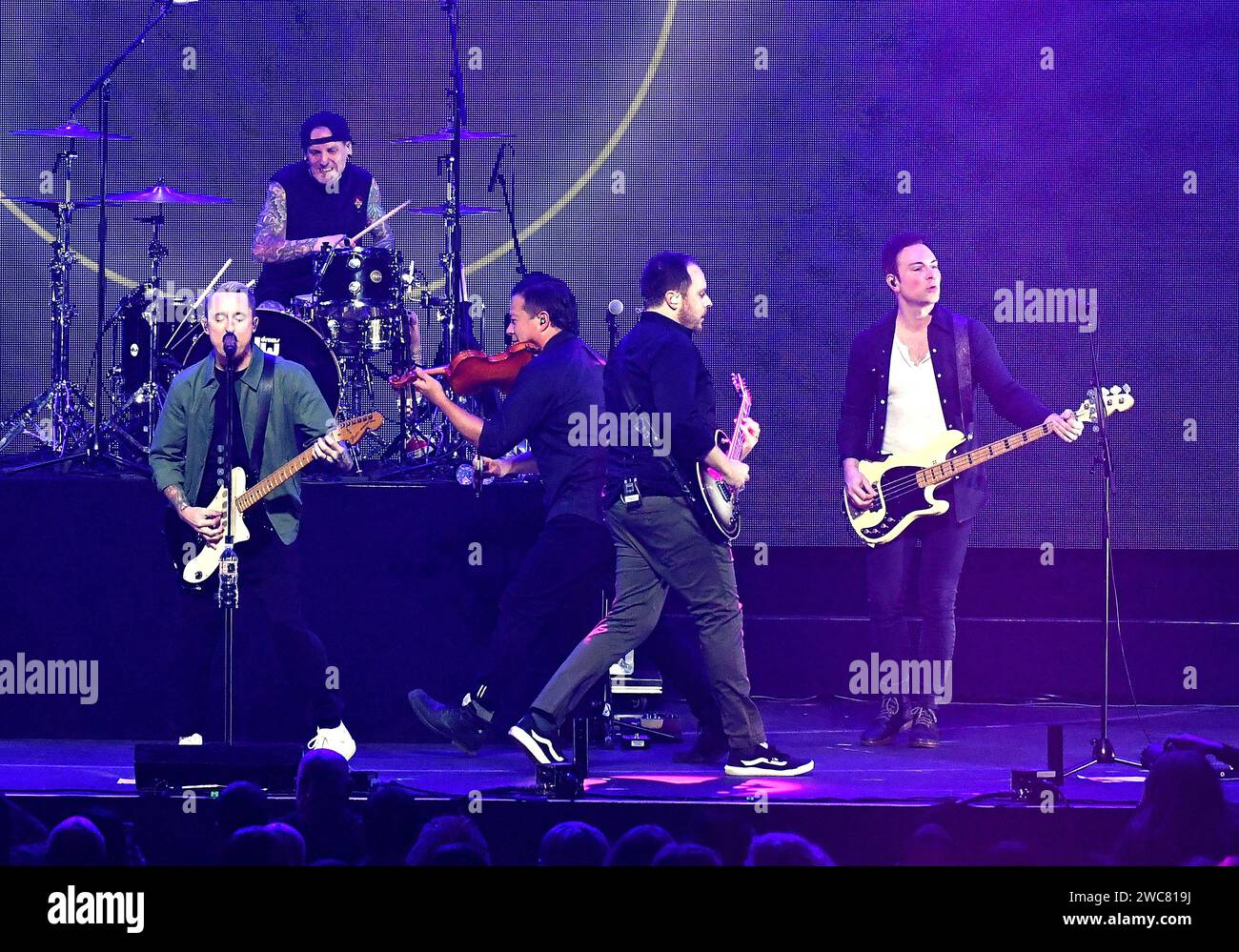 Anaheim, USA. 14th Jan, 2024. Yellowcard - Sean Mackin, Ryan Key, Josh ...