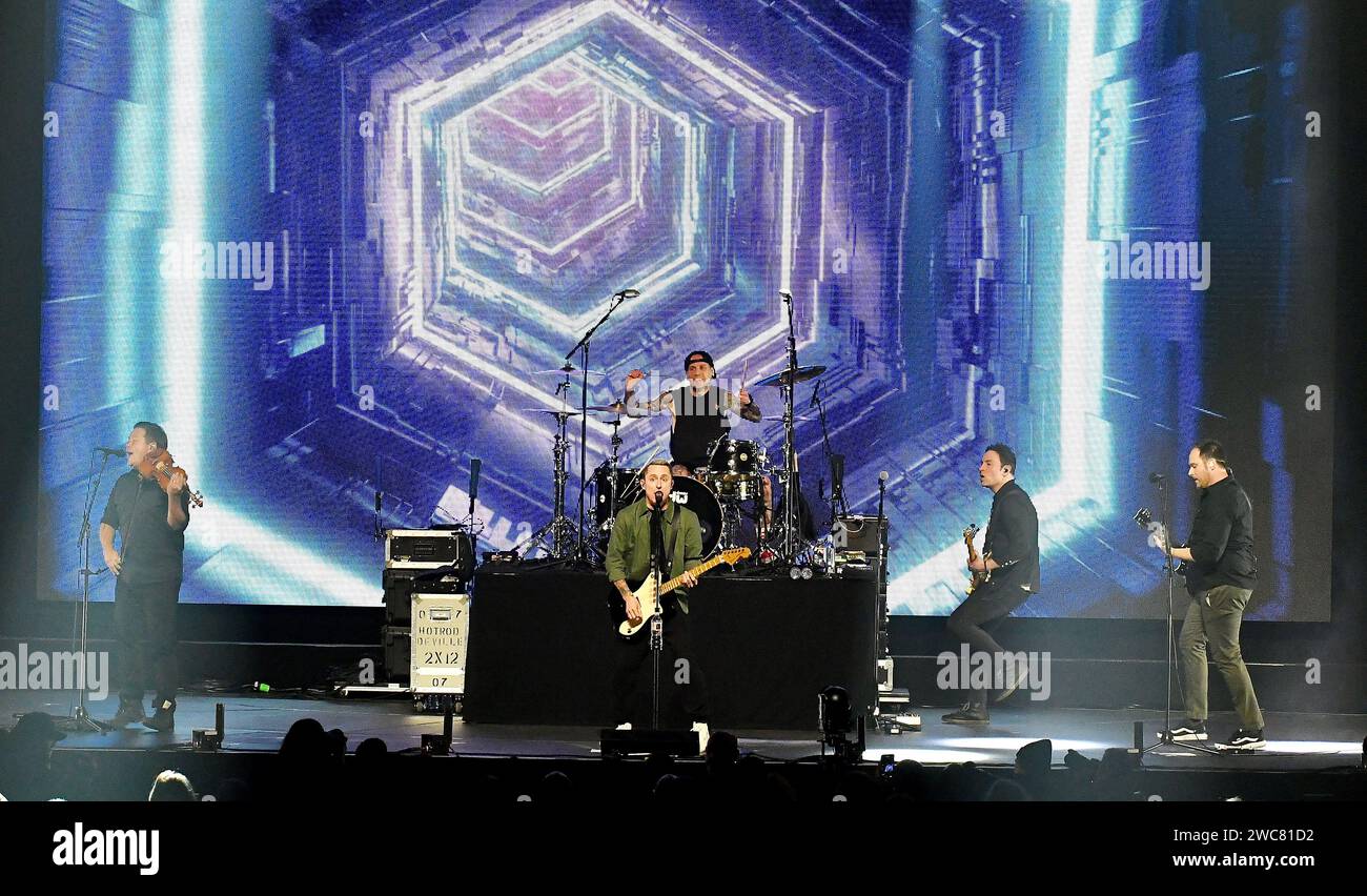 Anaheim, USA. 14th Jan, 2024. Yellowcard - Sean Mackin, Ryan Key, Josh ...