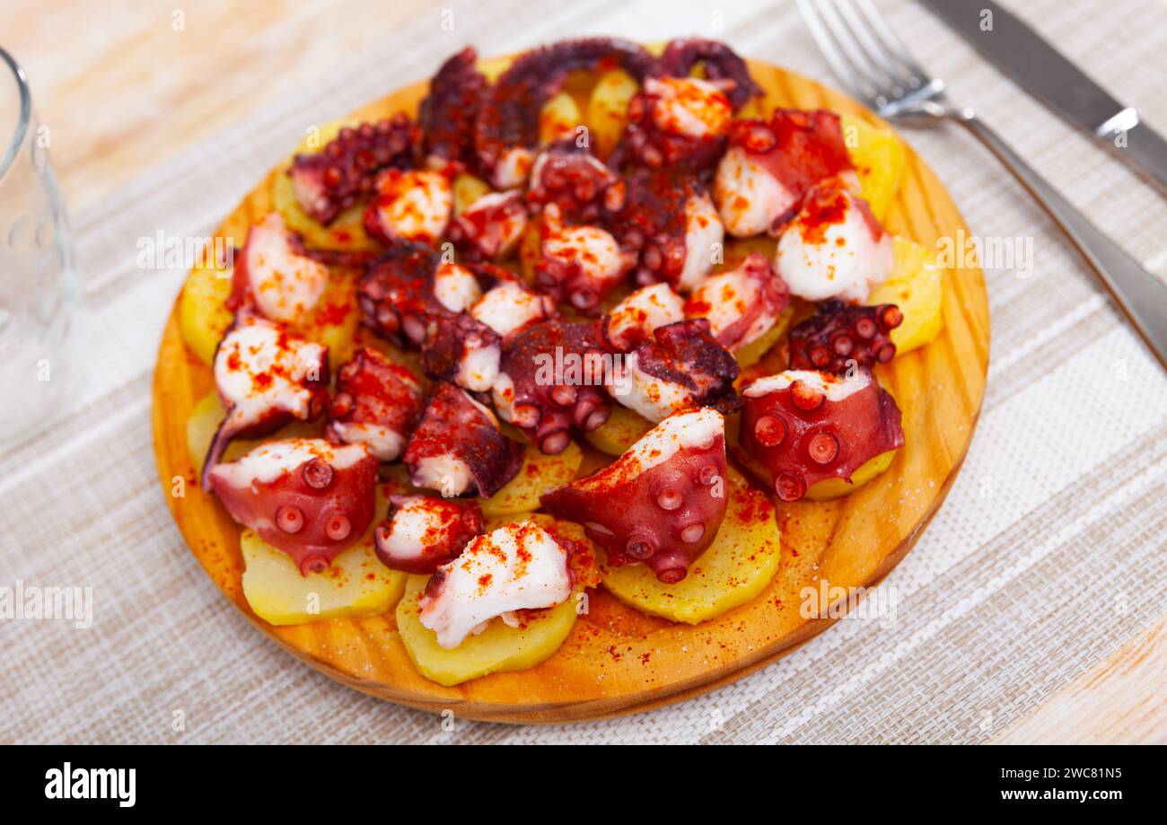 Dish of Spanish cuisine is the octopus in Galician Stock Photo - Alamy