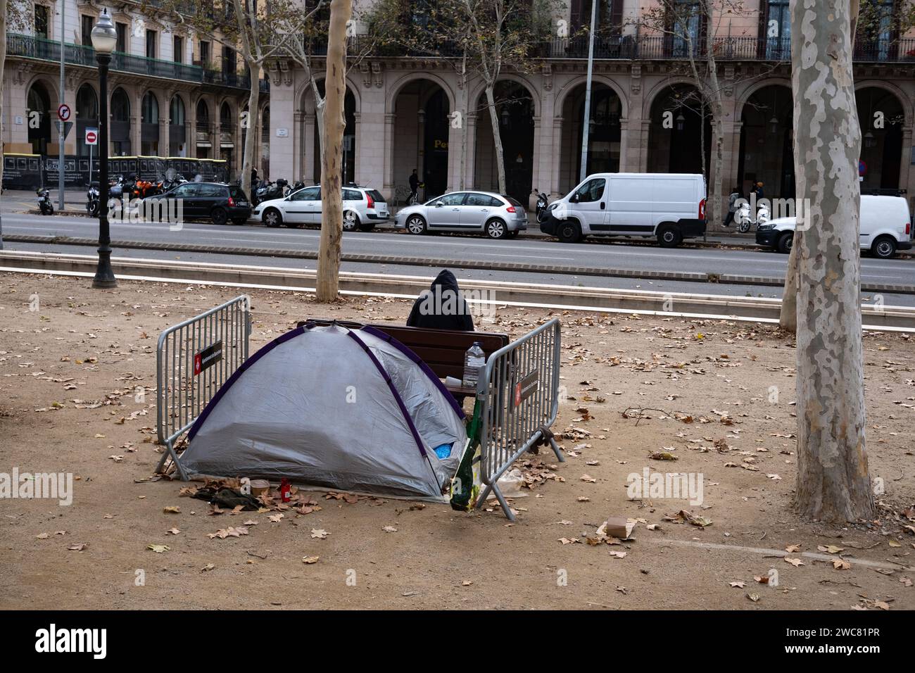 Barcelona, Spain. 14th Jan, 2024. A homeless man is seen with his ...