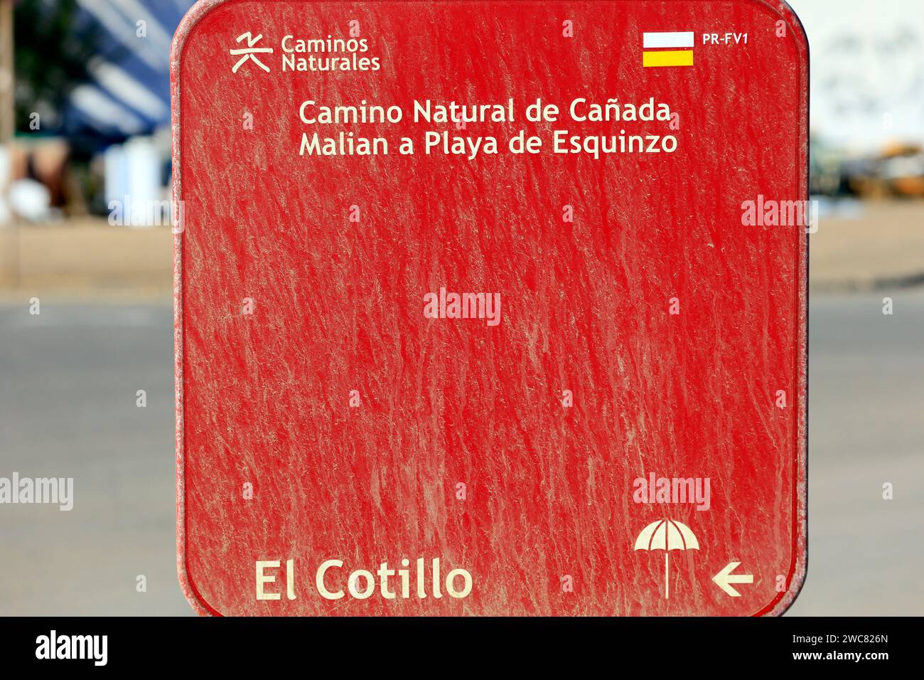 Dusty sign for Camino Naturales path at El Cotillo, Fuerteventura ...