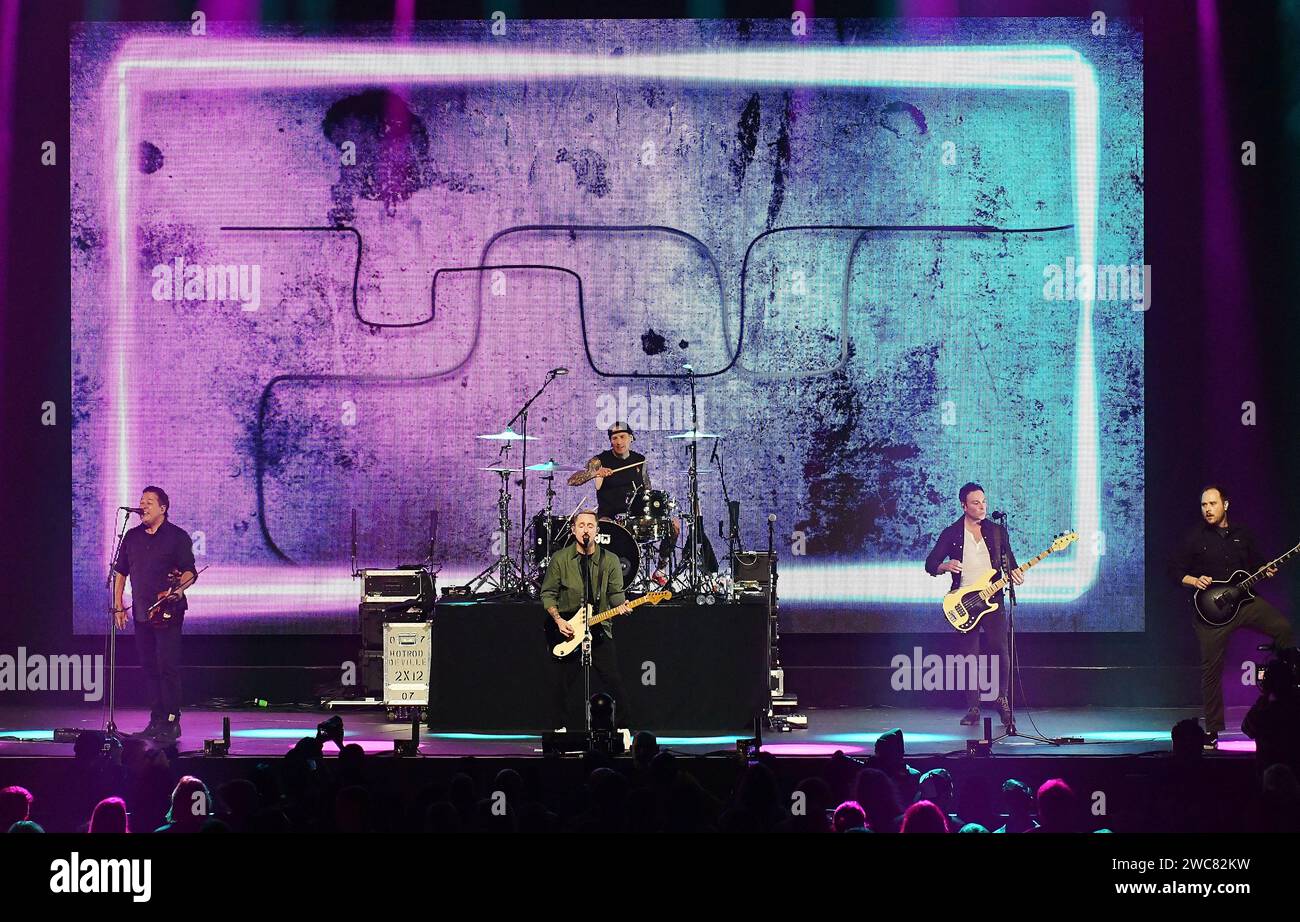 Anaheim, USA. 14th Jan, 2024. Yellowcard - Sean Mackin, Ryan Key, Josh ...