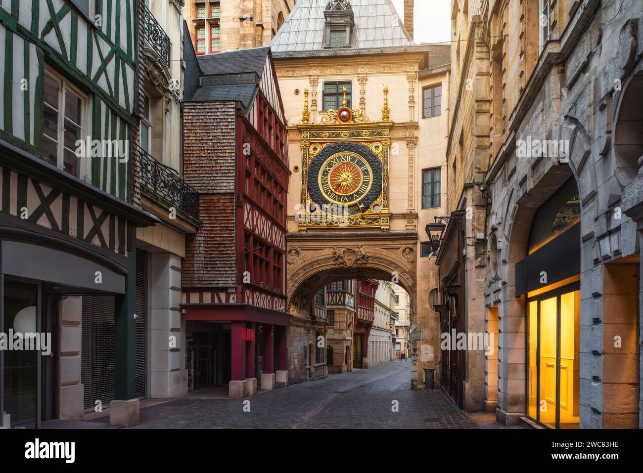 Medieval cozy street in Rouen with famos Great clocks or Gros Horloge ...