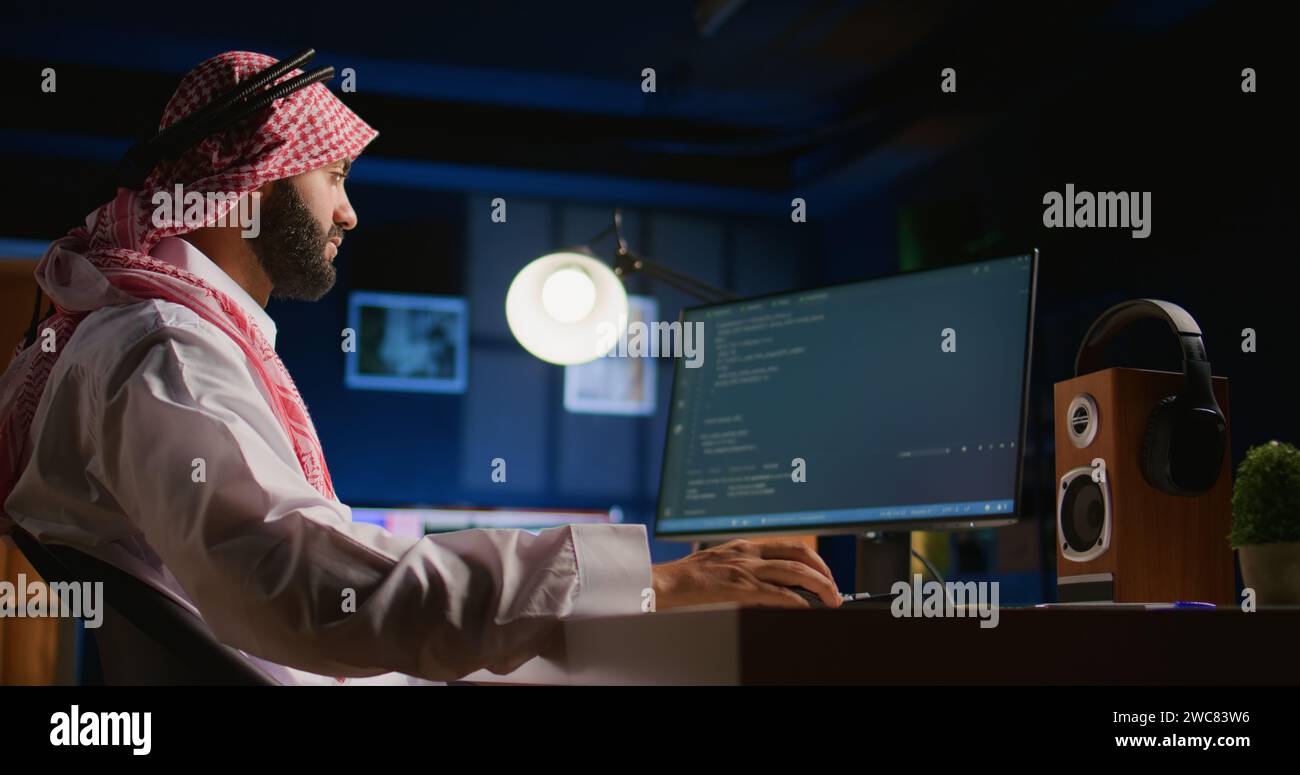 Arab Technician Writing Script Code On Computer Screen Inputting Commands On Terminal Middle
