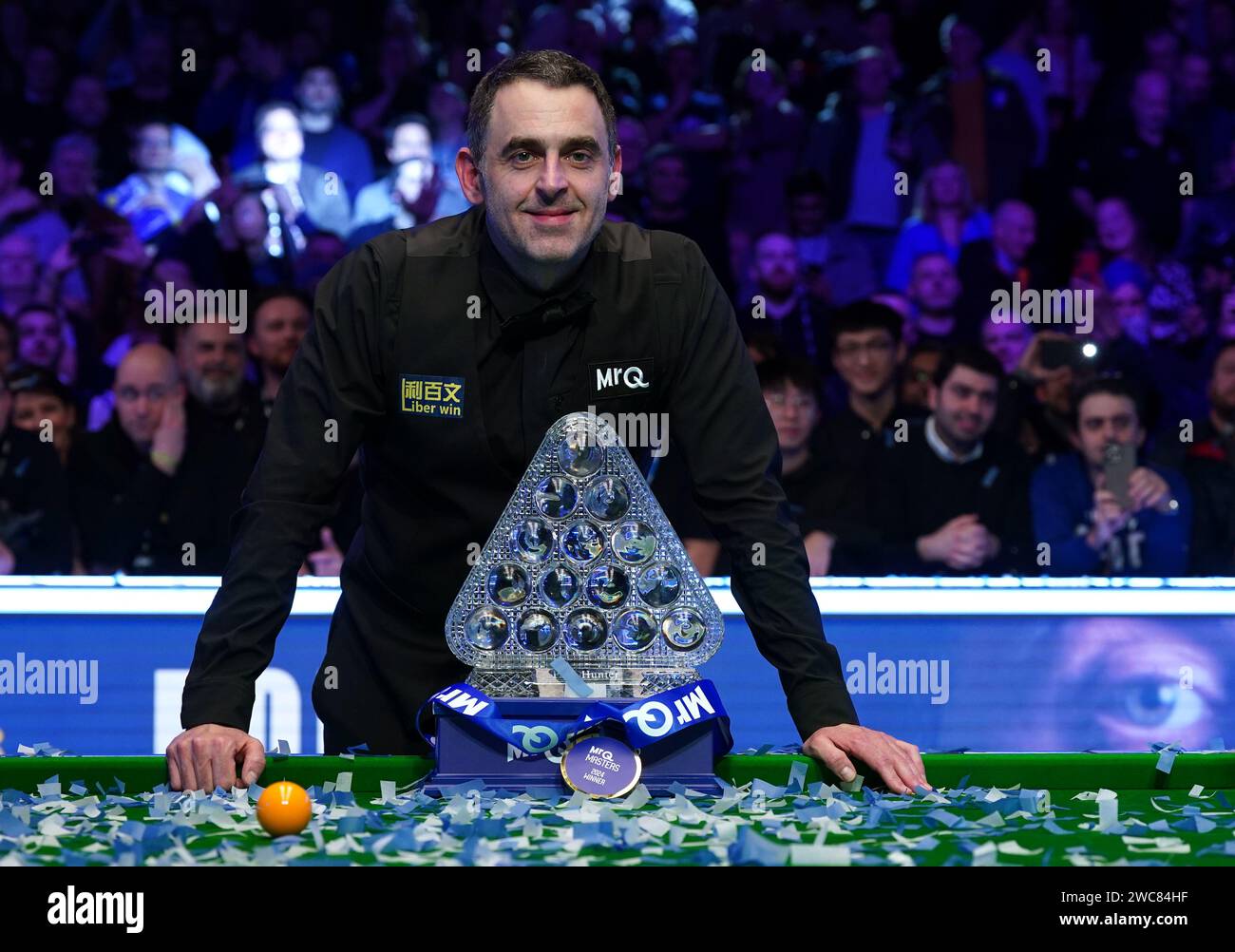 Ronnie O'Sullivan poses with the Paul Hunter trophy after victory over ...