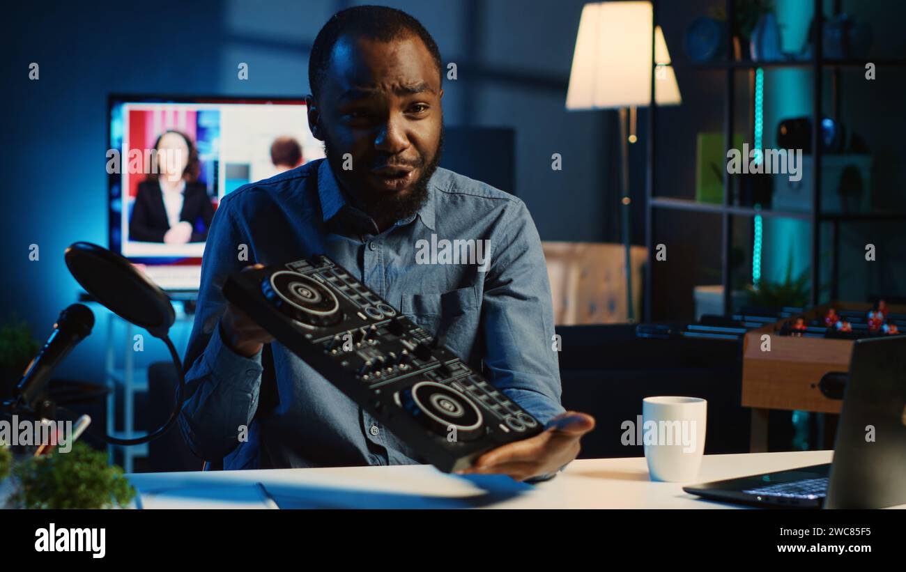 African american content creator filming technology review of newly ...