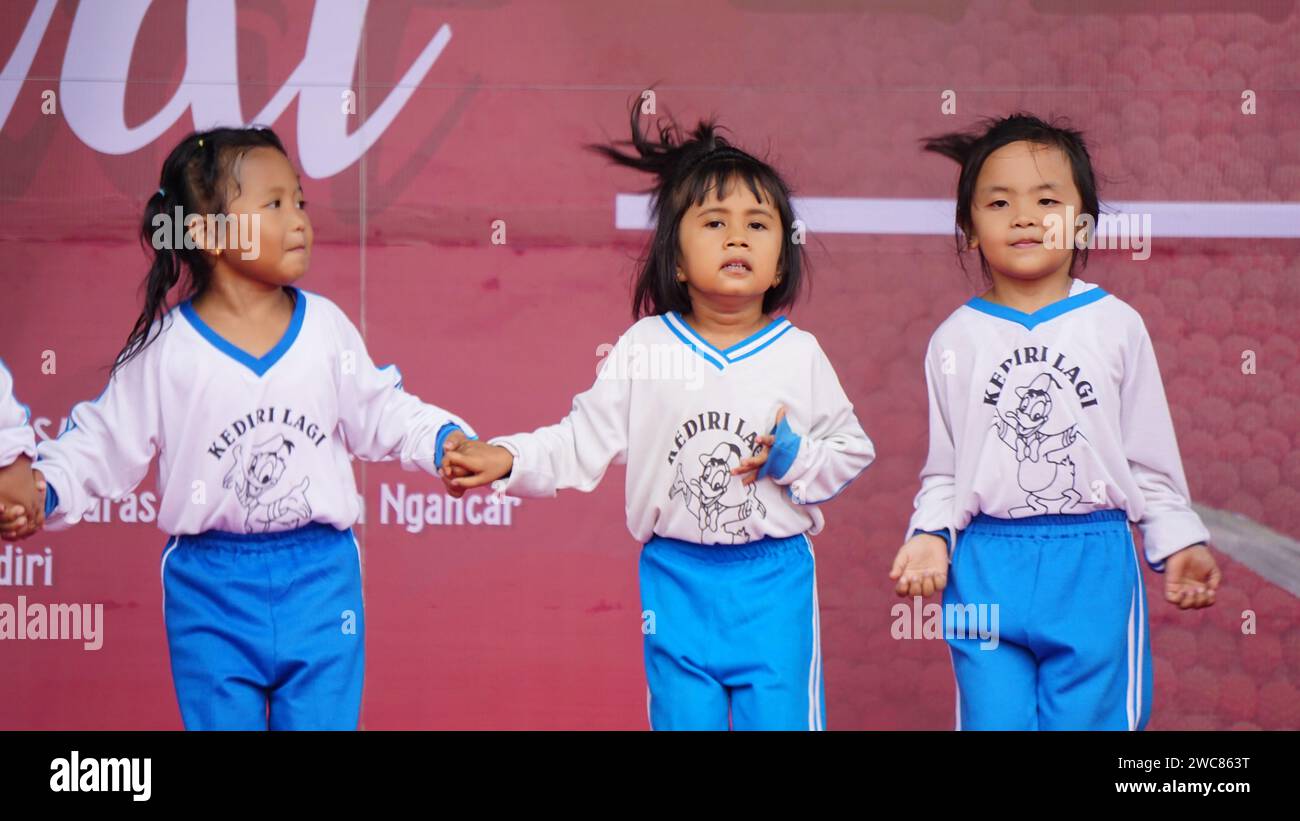 Kindergarten students play happily Stock Photo - Alamy
