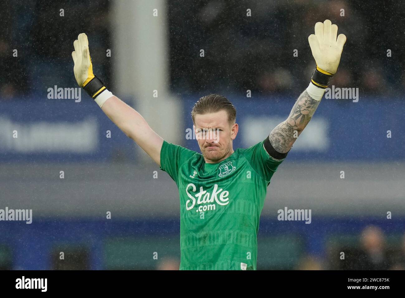 Liverpool, UK. 14th Jan, 2024. Jordan Pickford of Everton salutes the ...