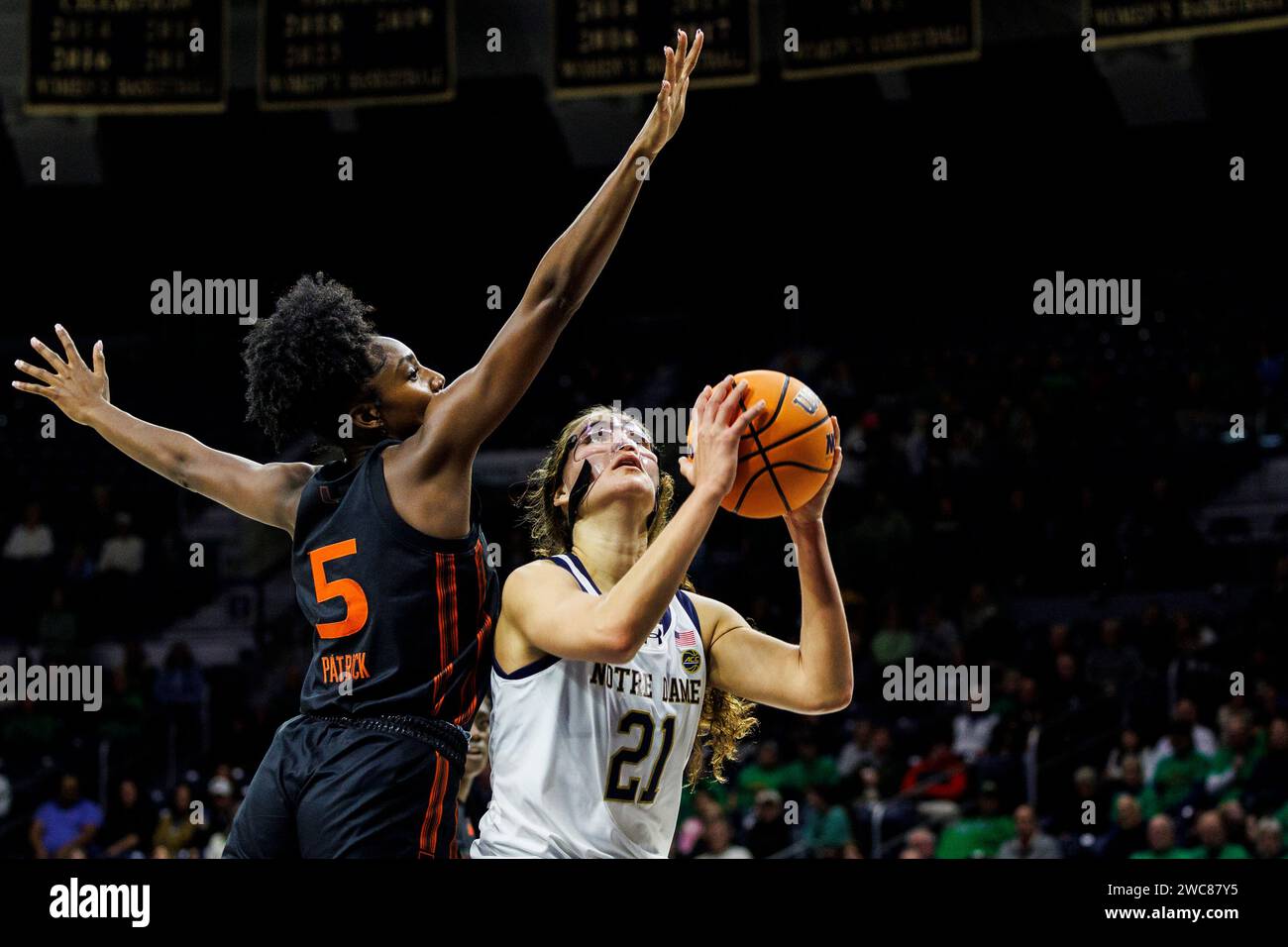 South Bend, Indiana, USA. 14th Jan, 2024. Notre Dame forward Maddy Westbeld (21) goes up for a ...