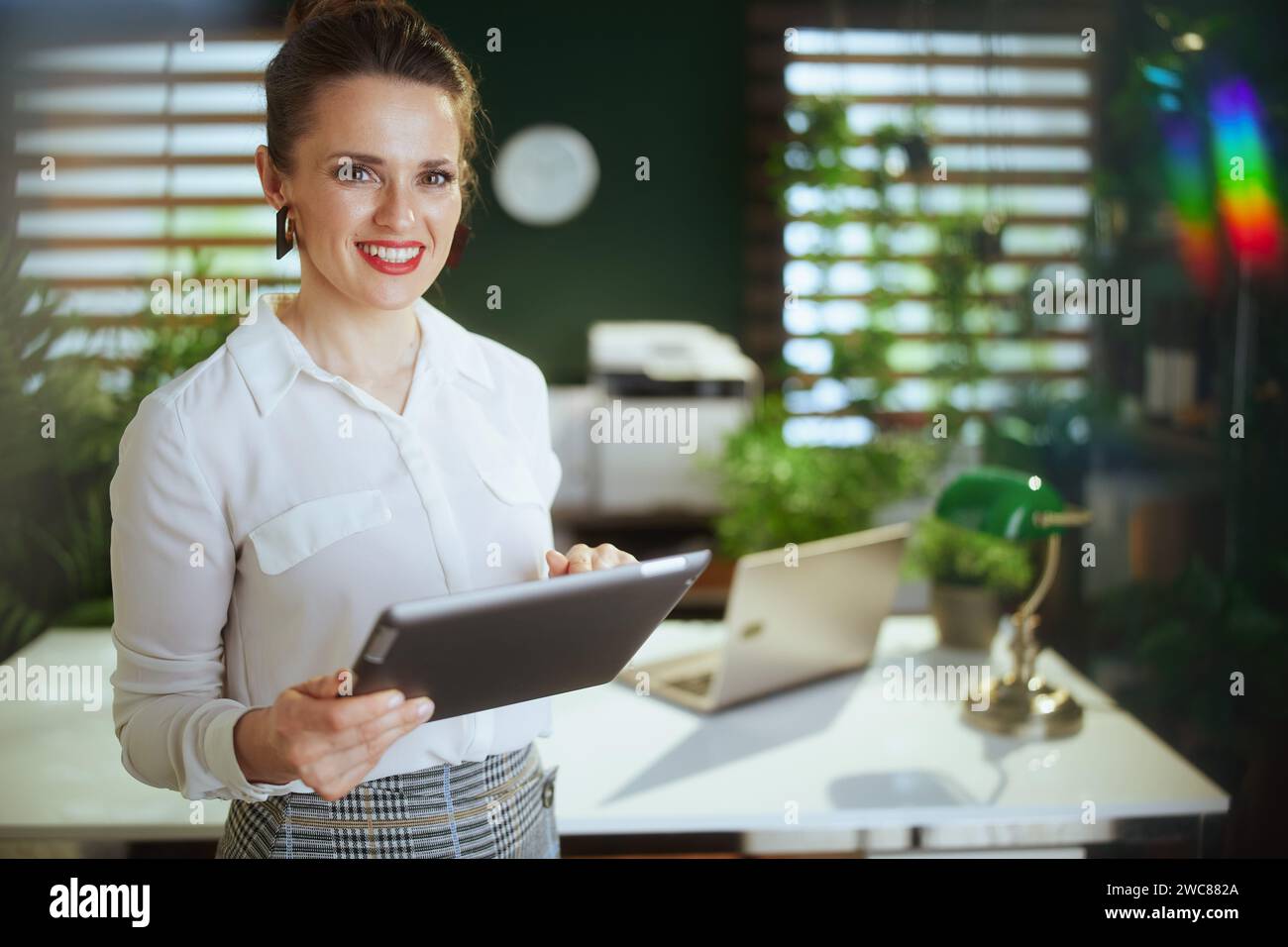 Sustainable real estate business. happy modern middle aged woman real ...