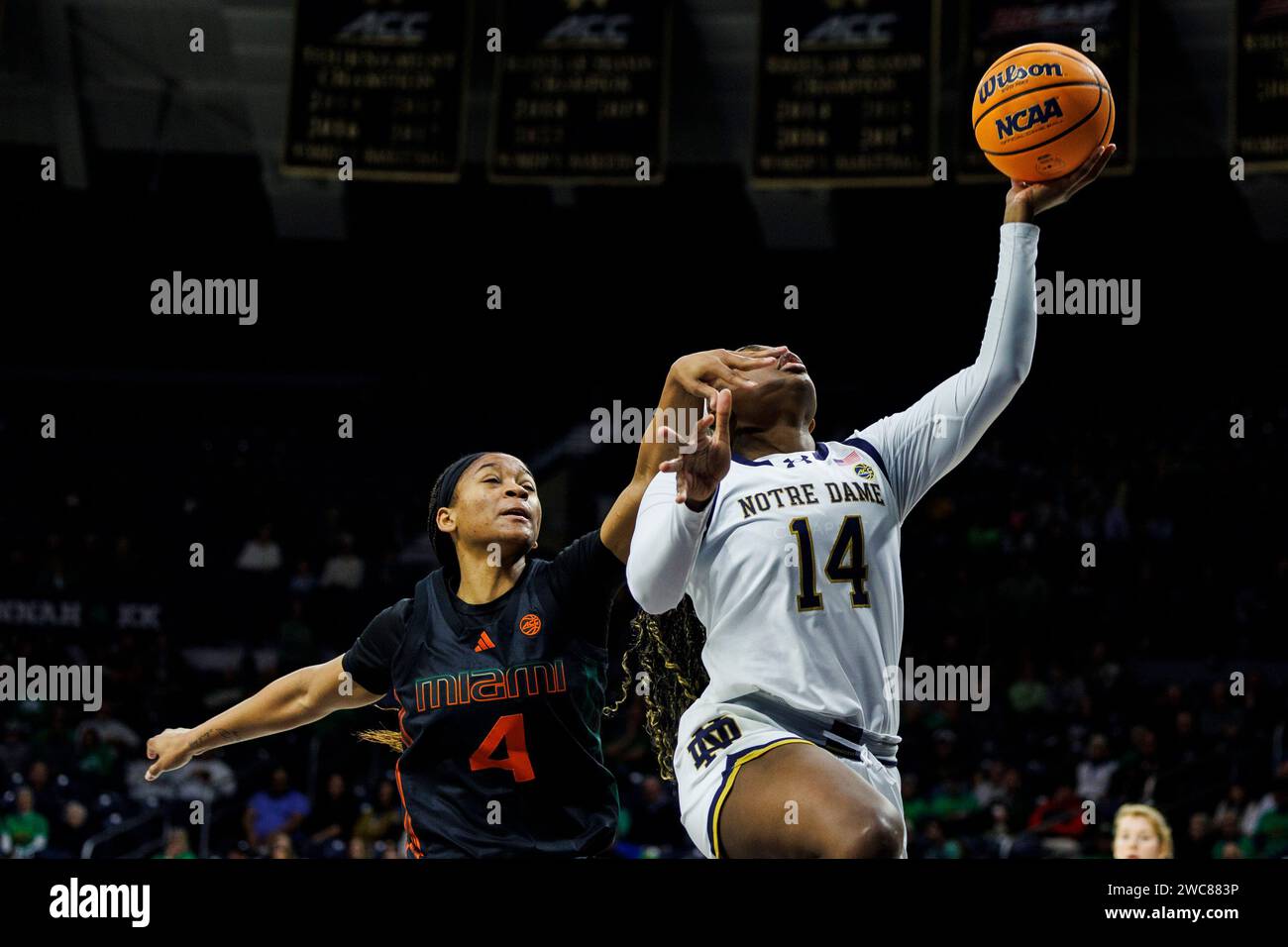 South Bend, Indiana, USA. 14th Jan, 2024. Notre Dame guard KK Bransford (14) goes up for a shot ...
