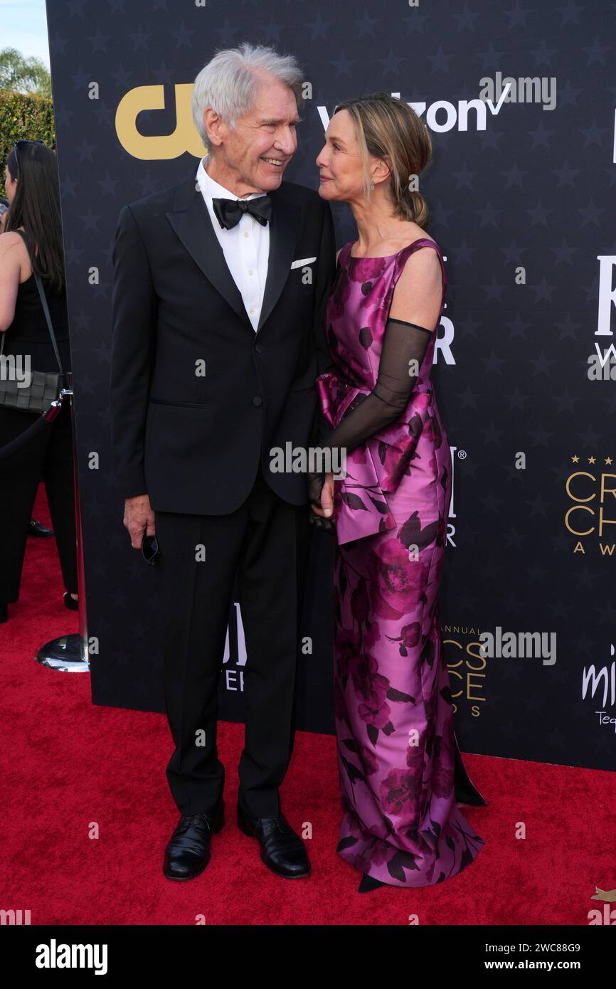 Harrison Ford, left, and Calista Flockhart arrive at the 29th Critics ...