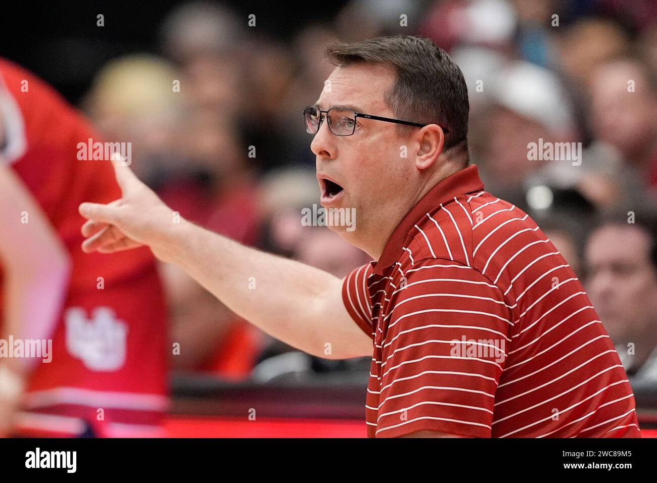 Stanford head coach Jerod Haase signals from the bench during the first ...