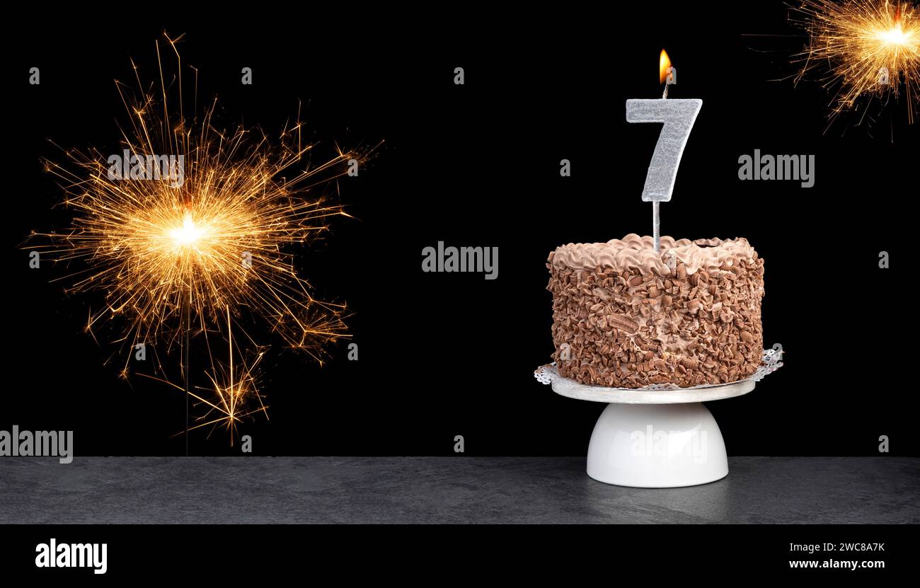 Cake with candle number 7 - Birthday card Stock Photo - Alamy Cake with candle number 7 - Birthday card Stock Photo - Alamy
