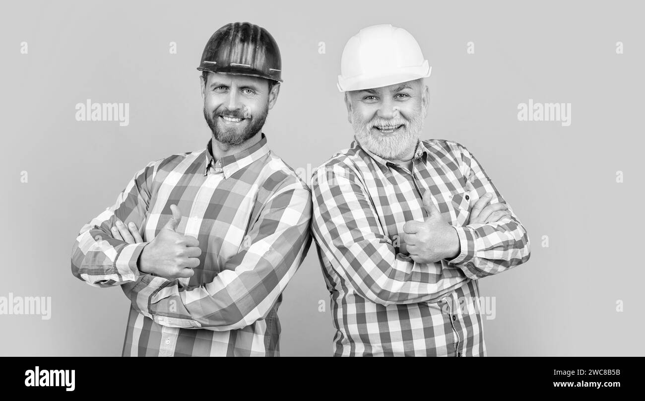 workman generation men on background, thumb up. photo of workman ...