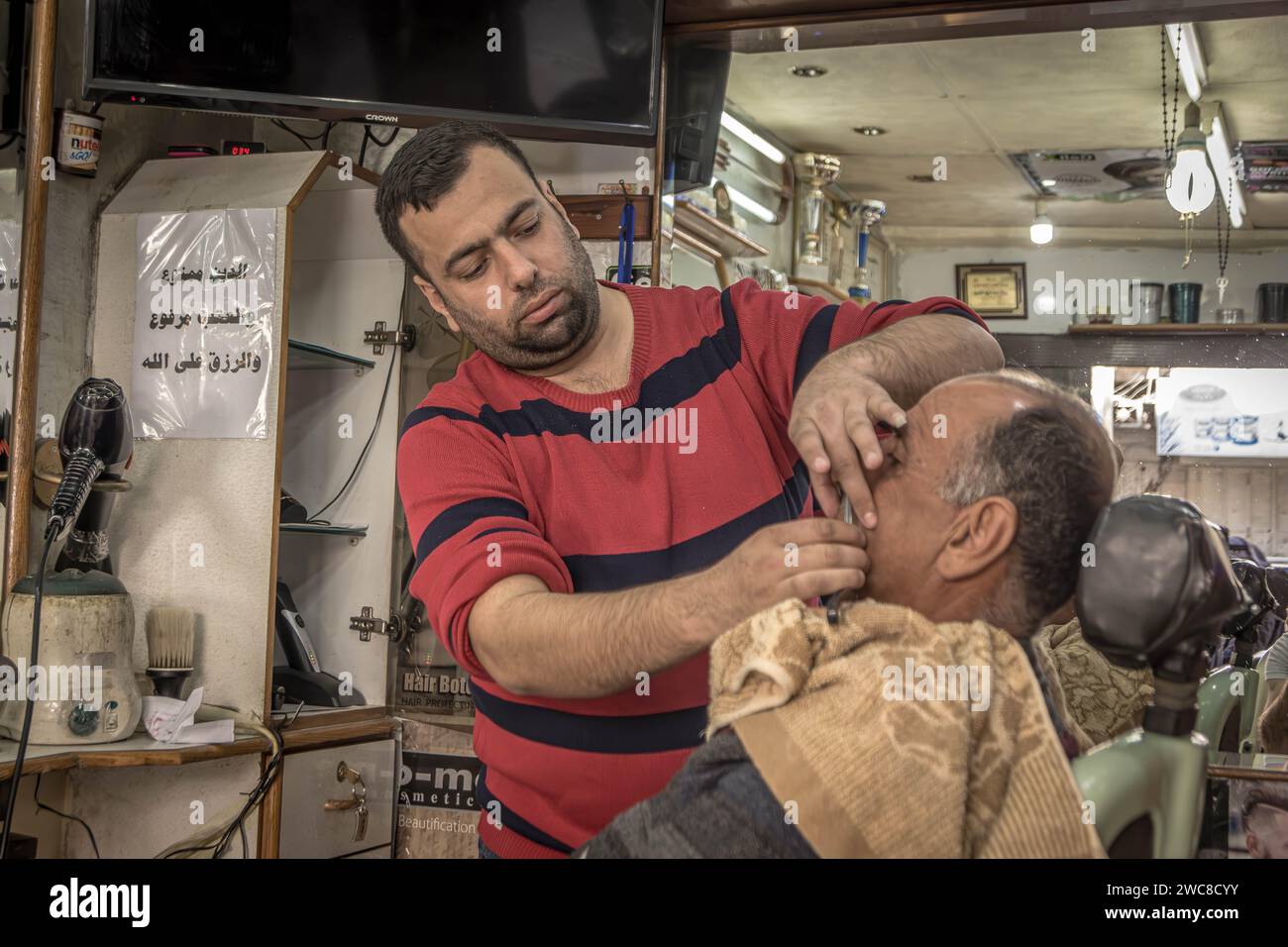 Palestinian barber hi-res stock photography and images - Alamy