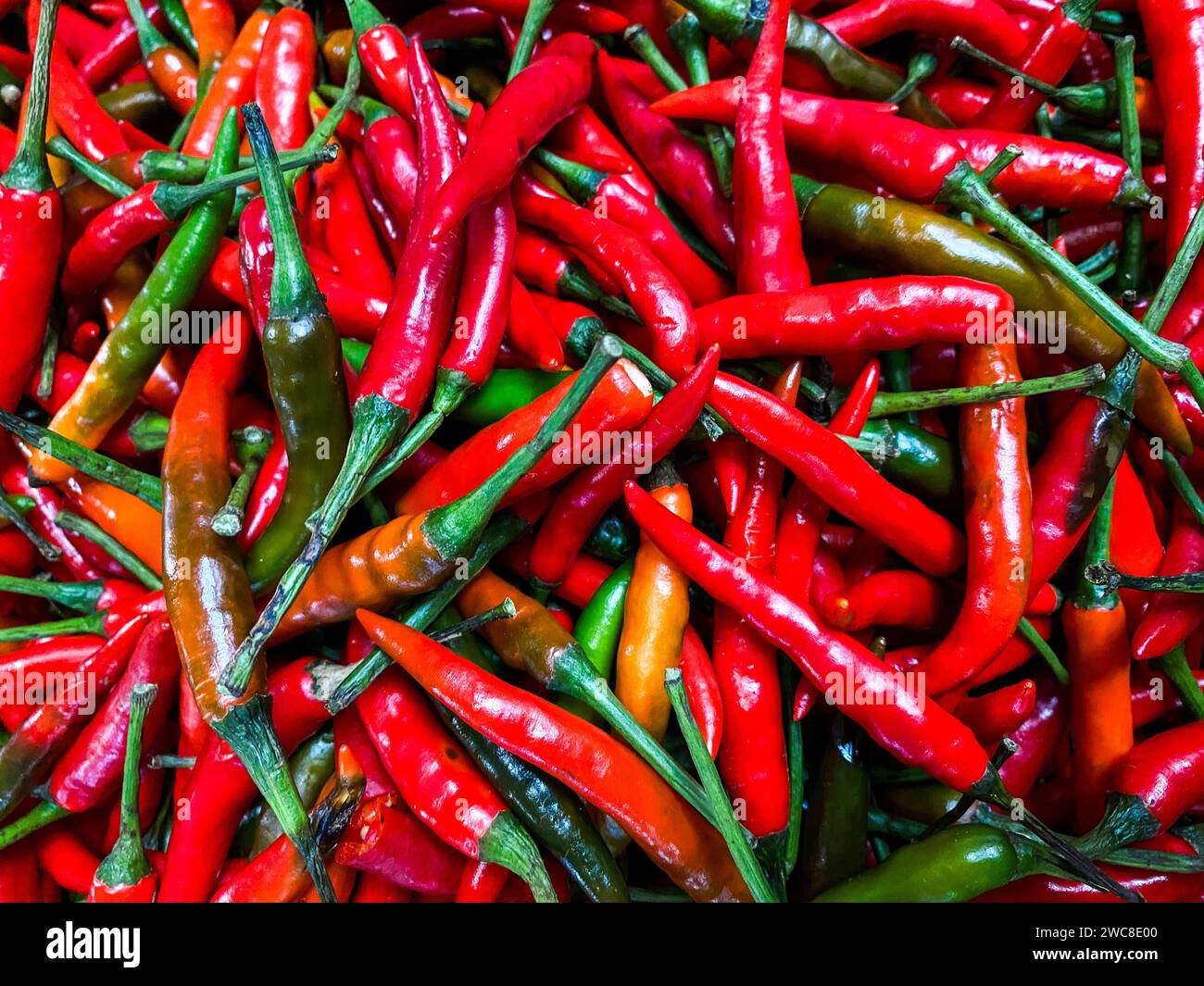 Red hot chilli peppers texture background. Close up view with copy ...