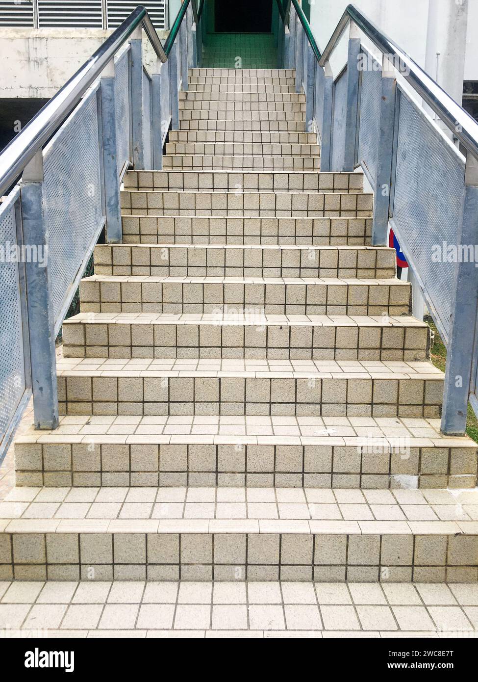 The metal structure of the railing adds an industrial touch to the ...