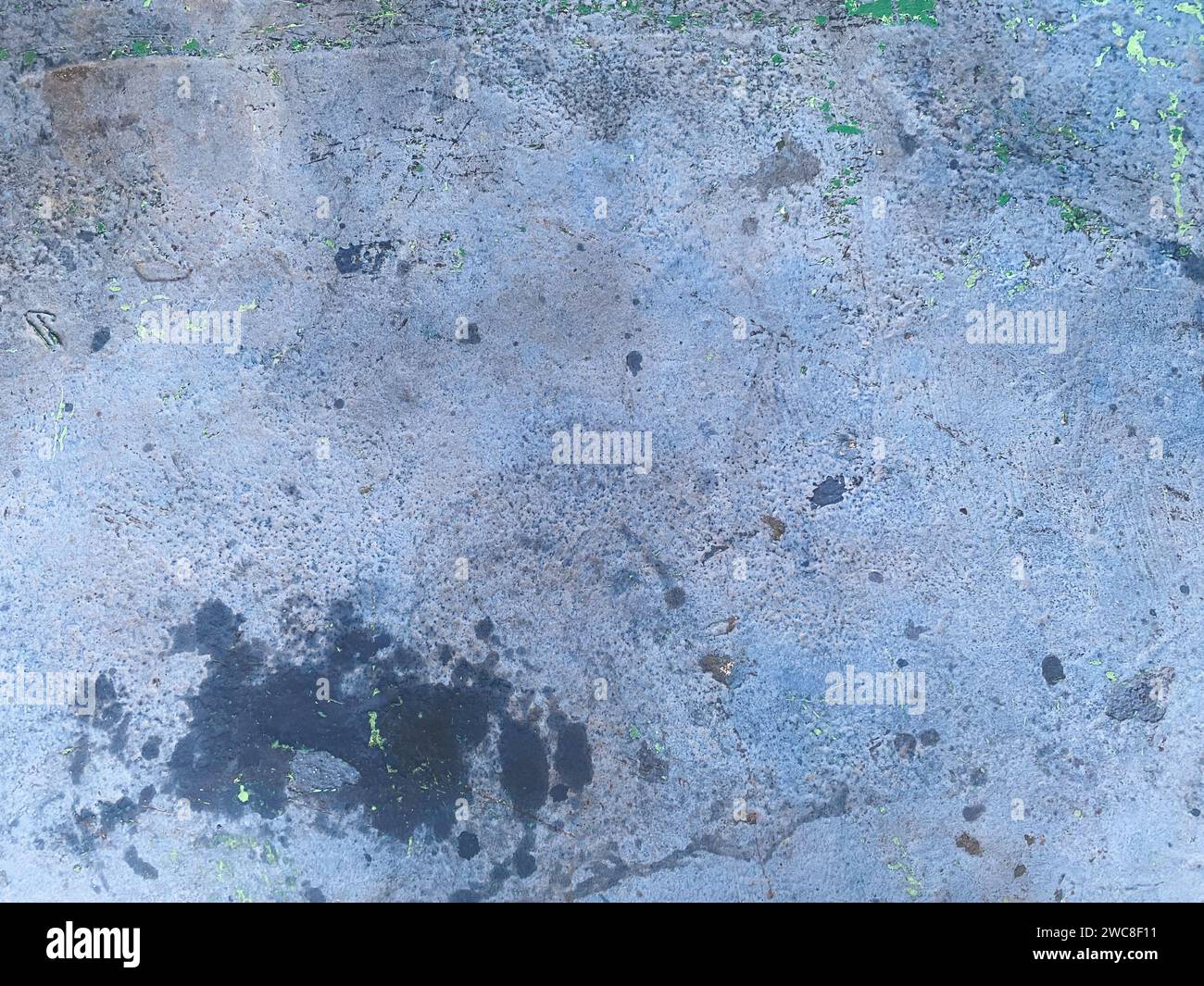 white-painted concrete floor with a crumpled effect, adding texture to ...