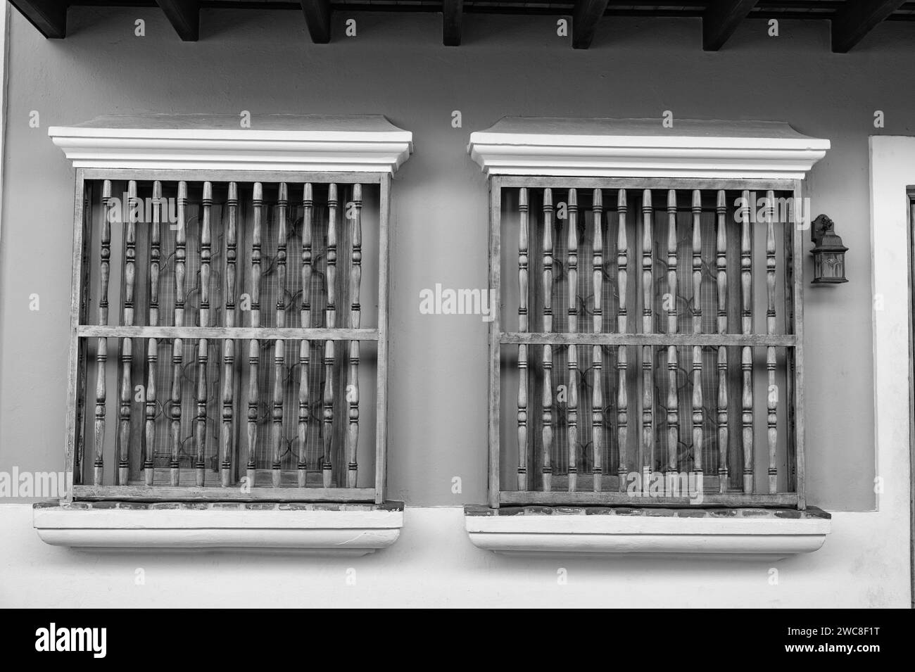 photo of two window exterior. house with window outdoor. building with ...