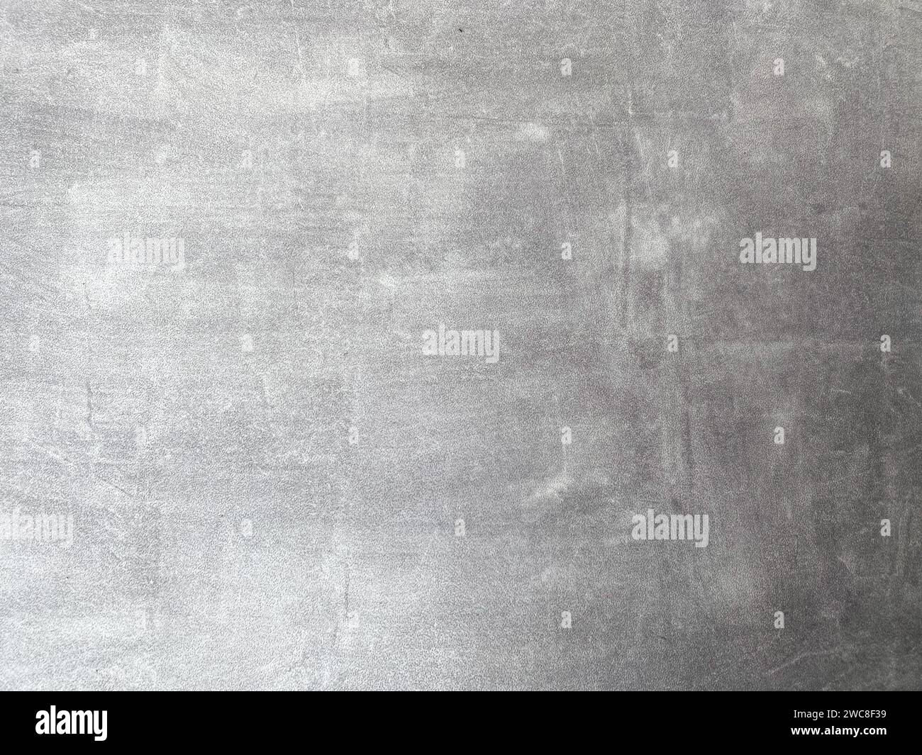 Grey and empty concrete wall, providing a neutral canvas for your ...