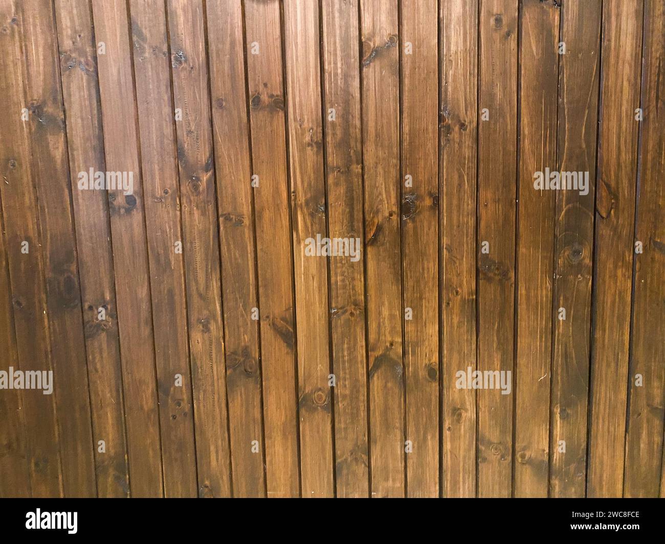 Abstract wooden structure with a mix of light and dark tones, offering ...