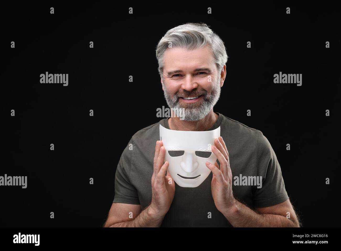 Happy mask fake hi-res stock photography and images - Alamy