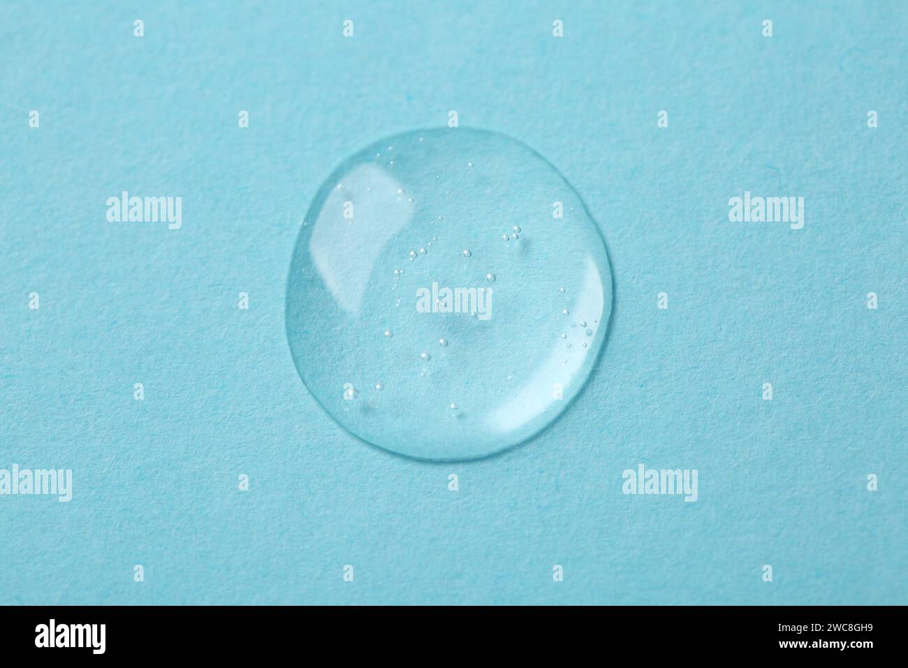 Sample of cosmetic serum on light blue background, top view Stock Photo ...