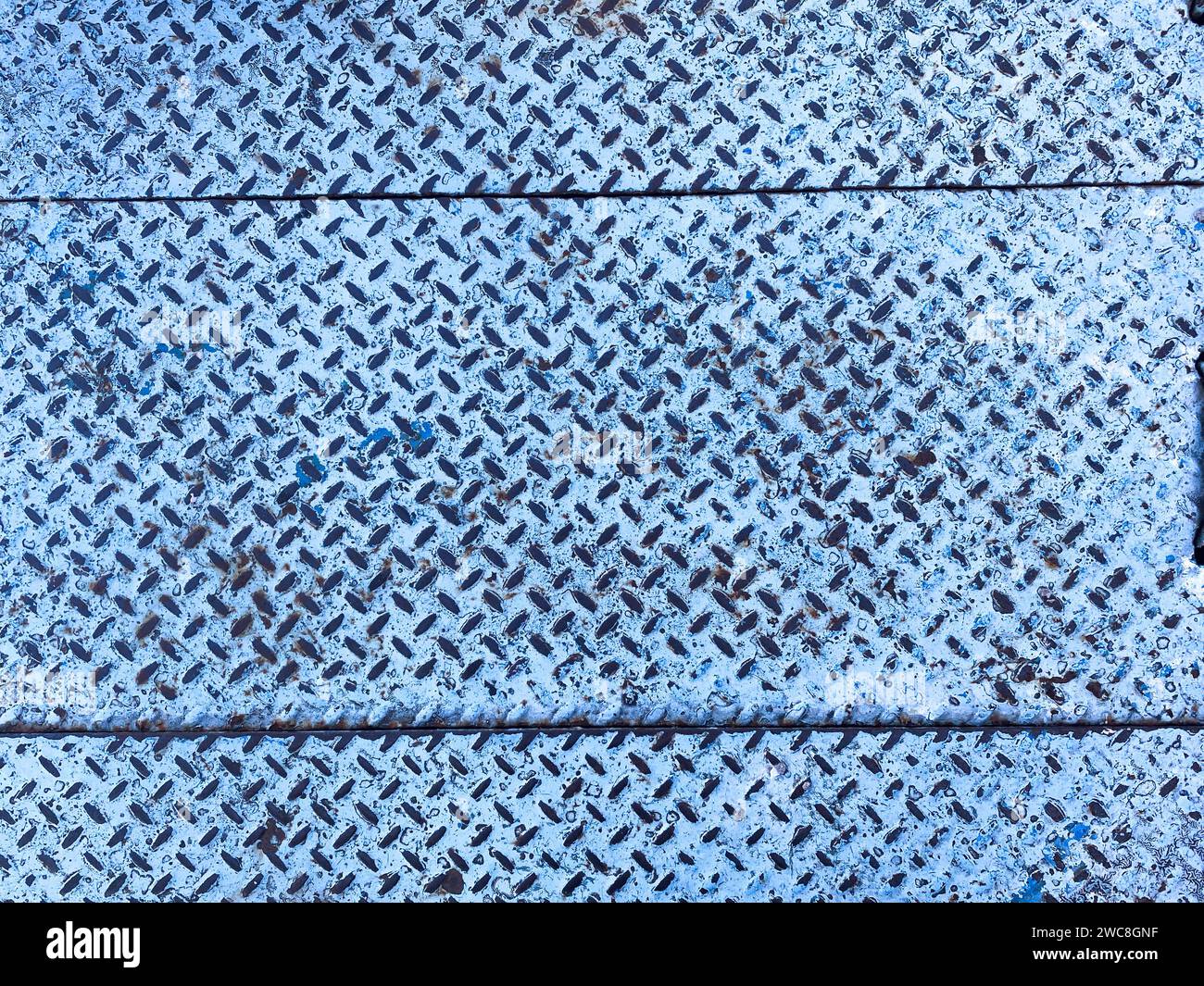 A blank metal texture background, providing a minimalist canvas for ...