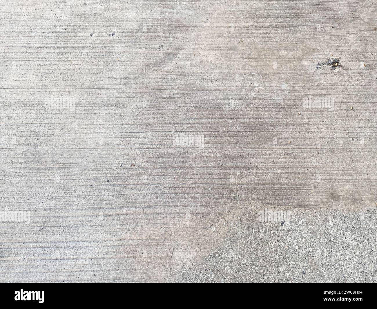 A bright and isolated concrete texture with a crumpled effect, creating ...