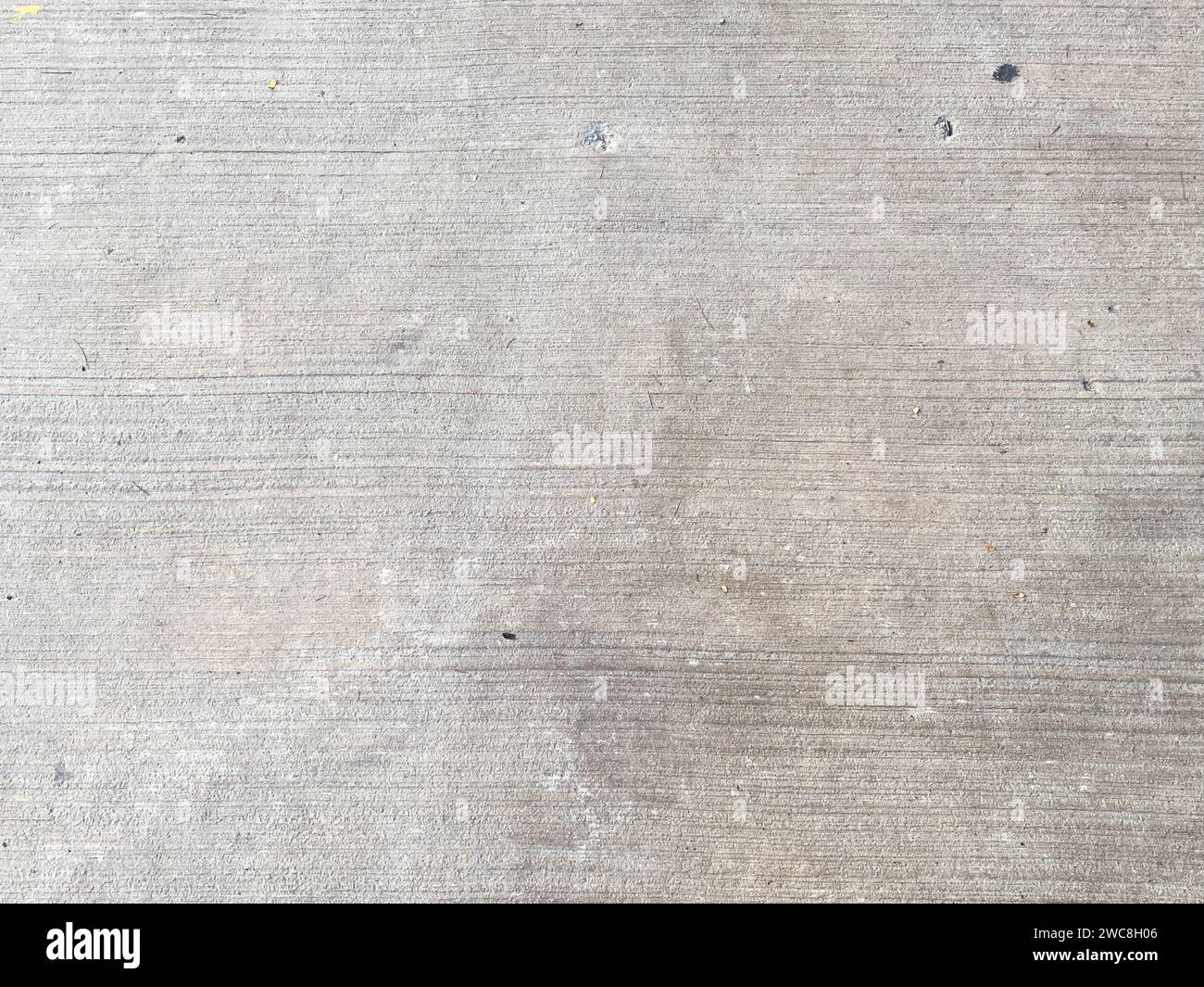 A bright and isolated concrete texture with a crumpled effect, creating ...