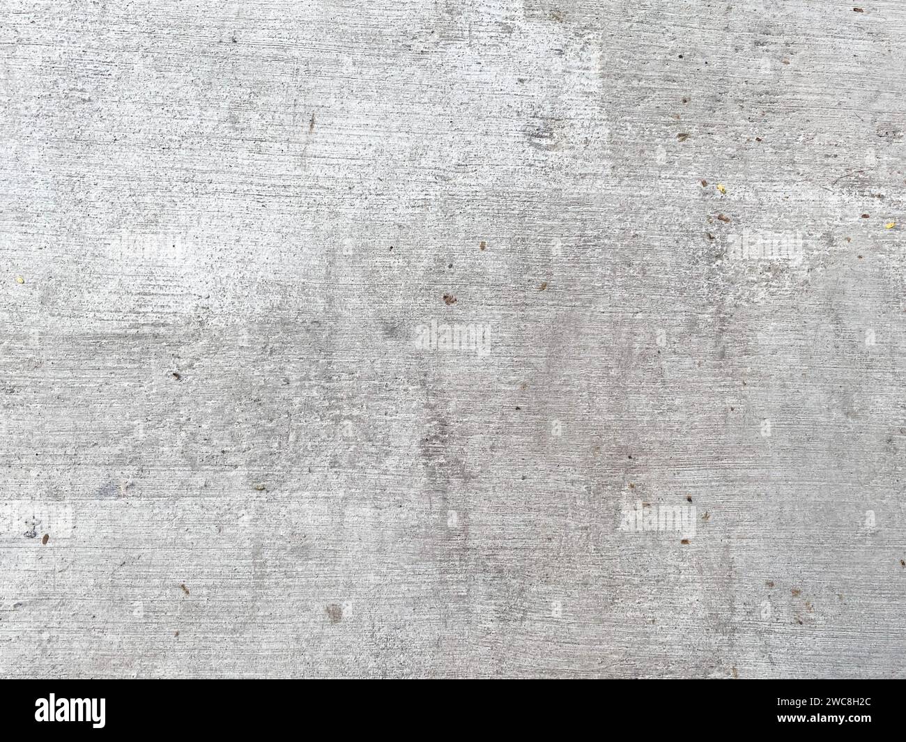 A dirty and messy concrete background, adding a touch of authenticity ...