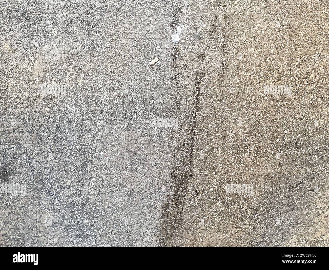A dirty and messy concrete background, adding a touch of authenticity ...
