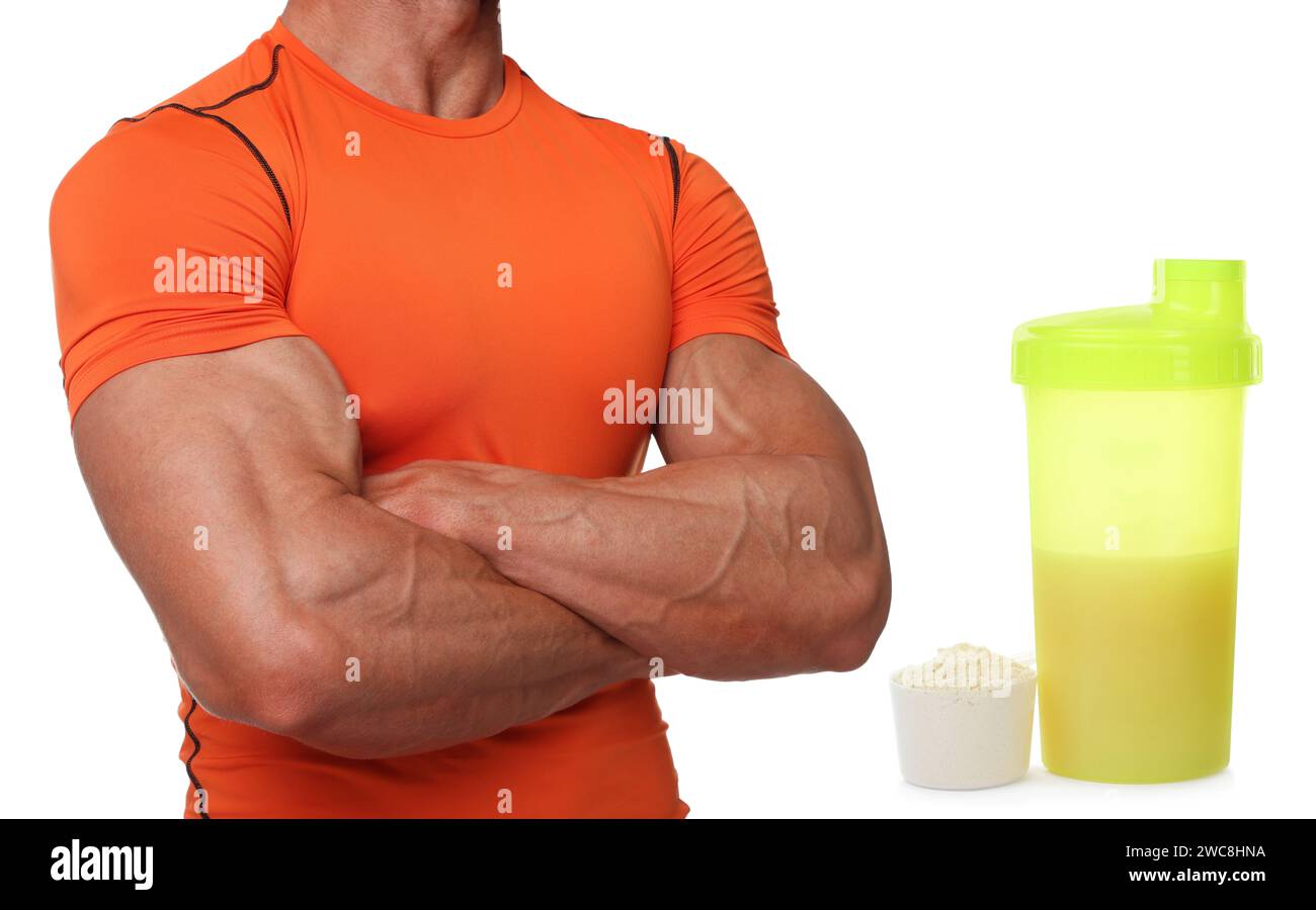 Bodybuilding. Man with muscular hands, protein powder and shaker ...