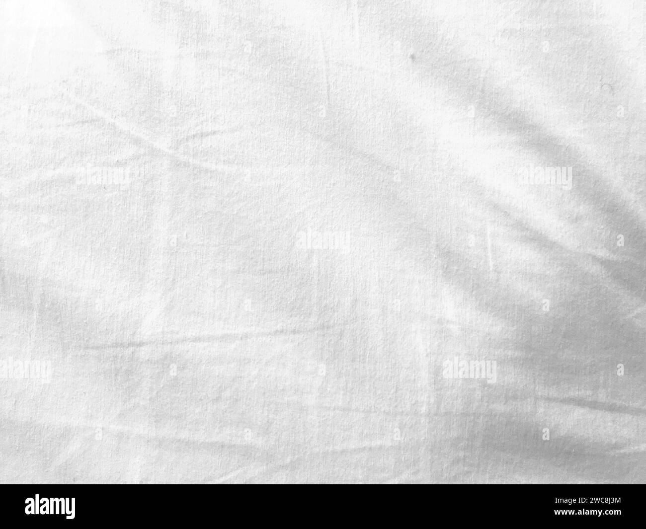The purity of white fabric forms a seamless banner, offering a pristine ...