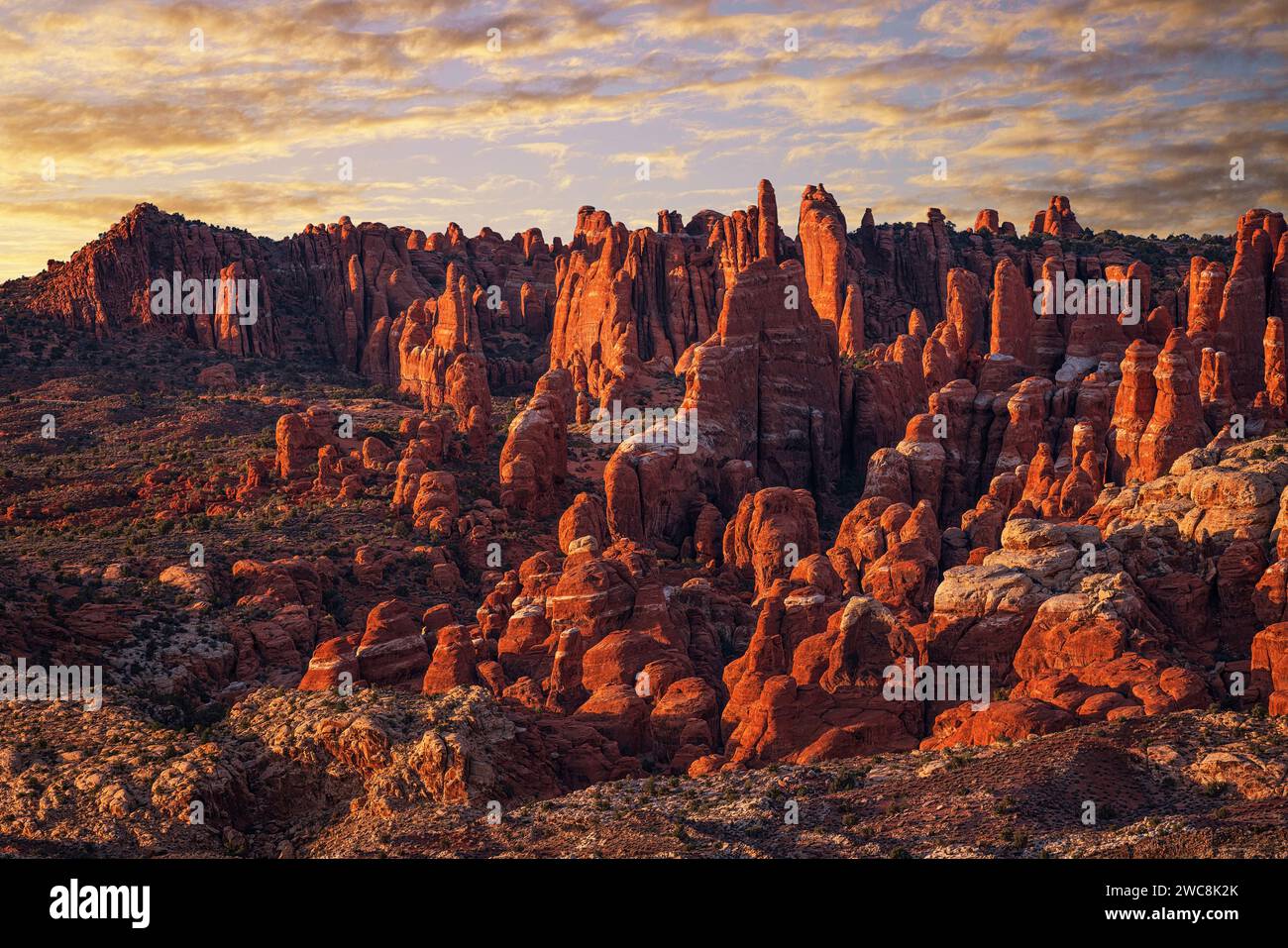 Sunset light illuminates the dramatic geology of the Fiery Furnace ...