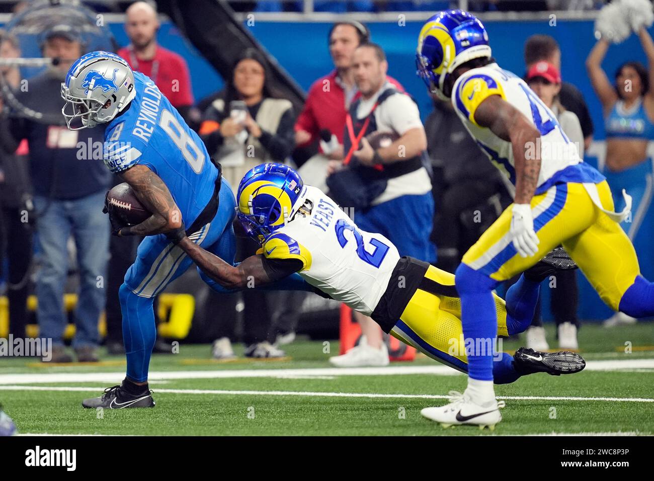 Los Angeles Rams safety Russ Yeast (2) stretches to tackle Detroit ...