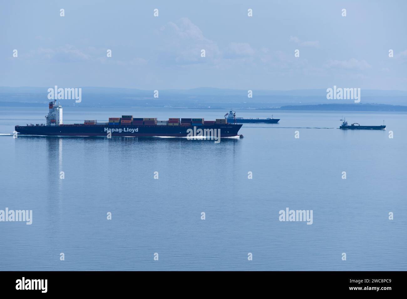 Container ship on Saint Lawrence river in Quebec, Canada Stock Photo ...