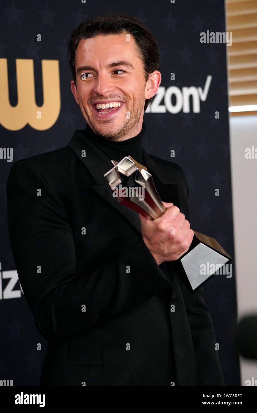 Jonathan Bailey poses in the press room with the award for best ...