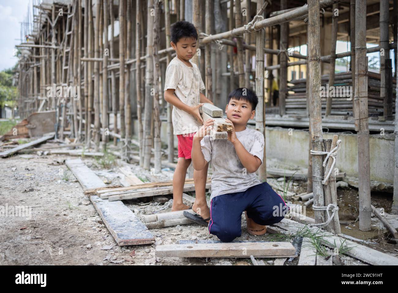 Children working at construction site for world day against child labor ...