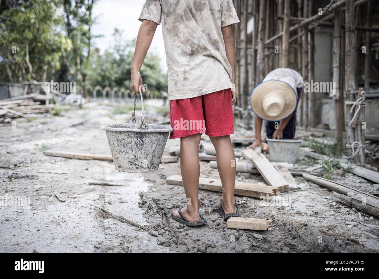 Children working at construction site for world day against child labor ...