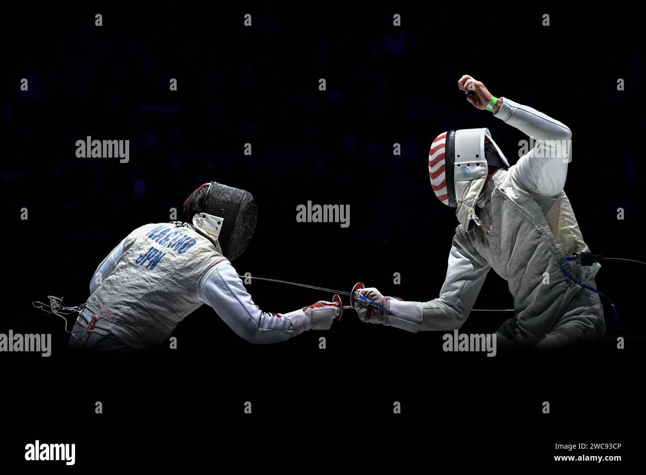 Paris, France. 14th Jan, 2024. USA foilist NICK ITKIN (R) competes ...