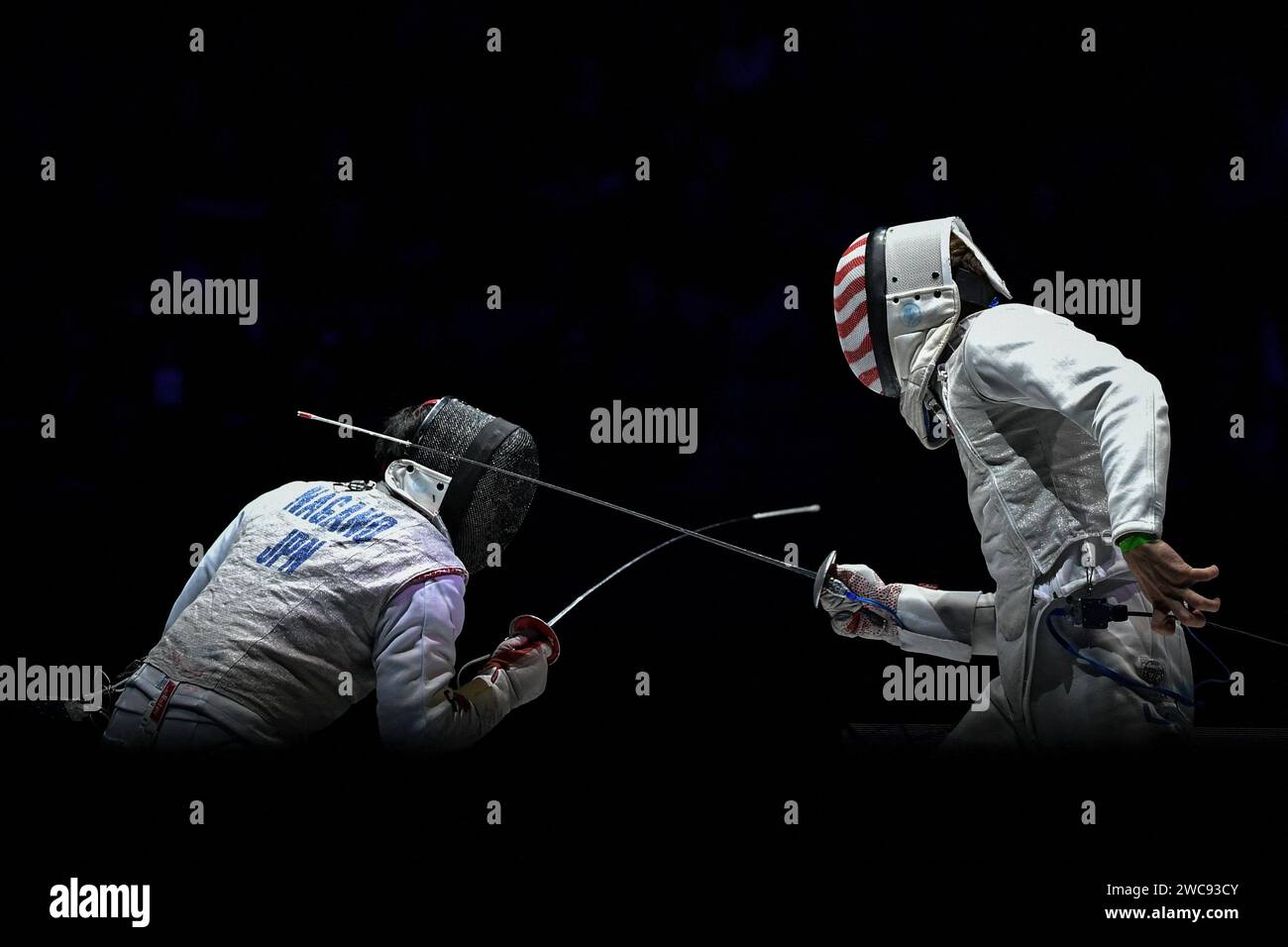 Paris, France. 14th Jan, 2024. USA foilist NICK ITKIN (R) competes ...