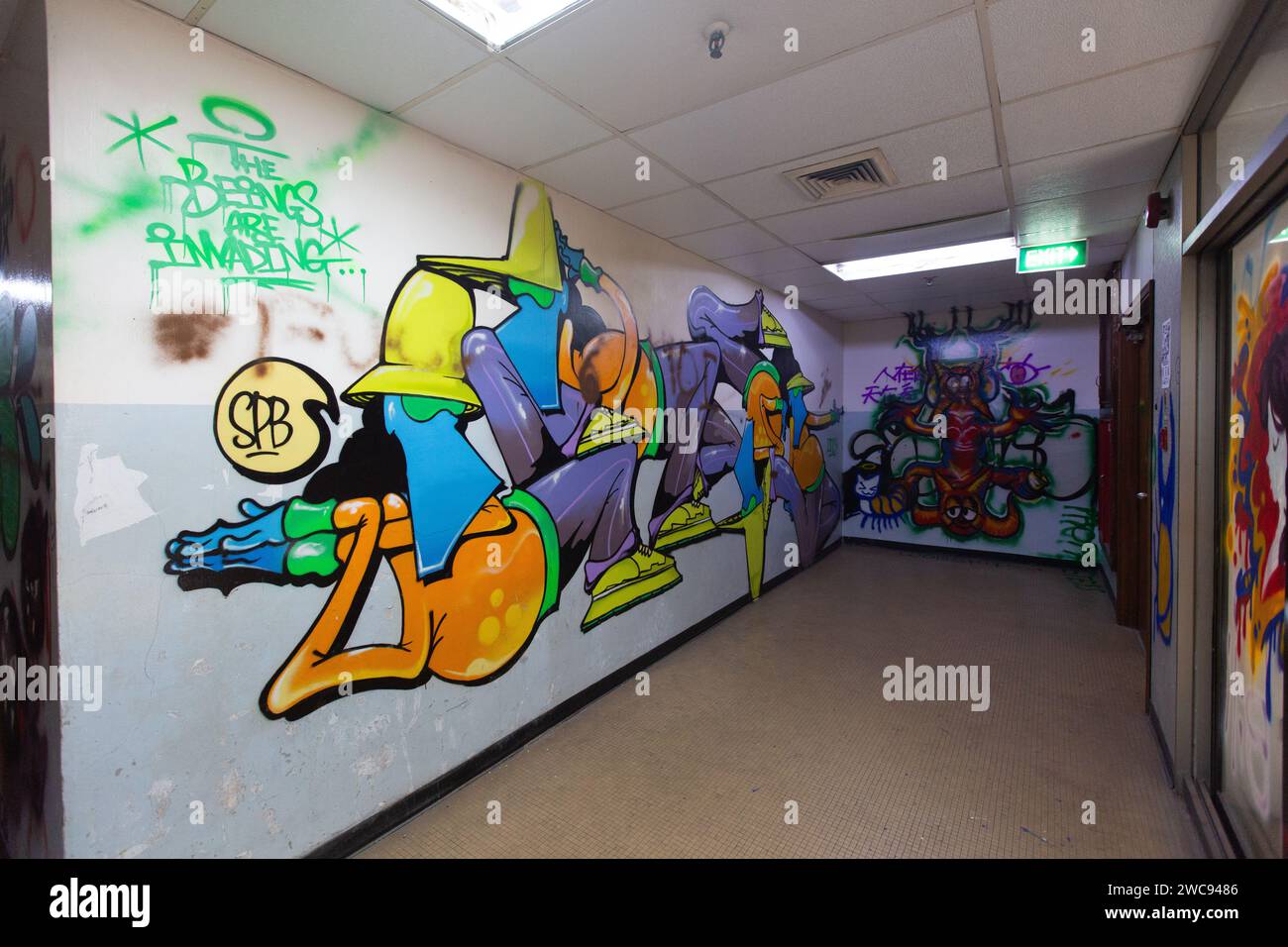 At the corner stretch inside a shopping mall, striking graffiti is ...